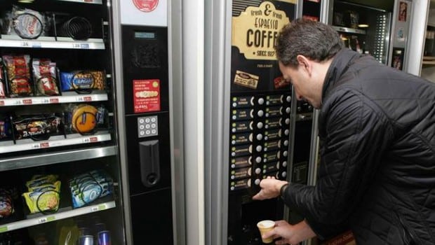 man-and-vending-machine | VendingConnection.com
